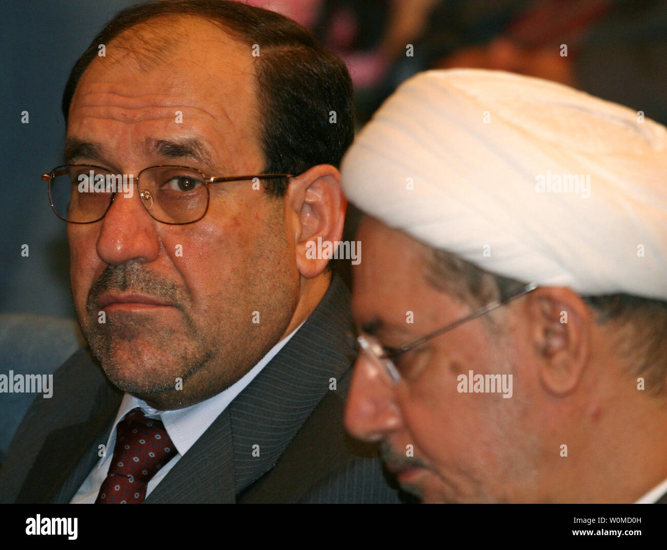 Iraqi Prime Minister Nuri al-Maliki (L) and Deputy Parliament Speaker ...