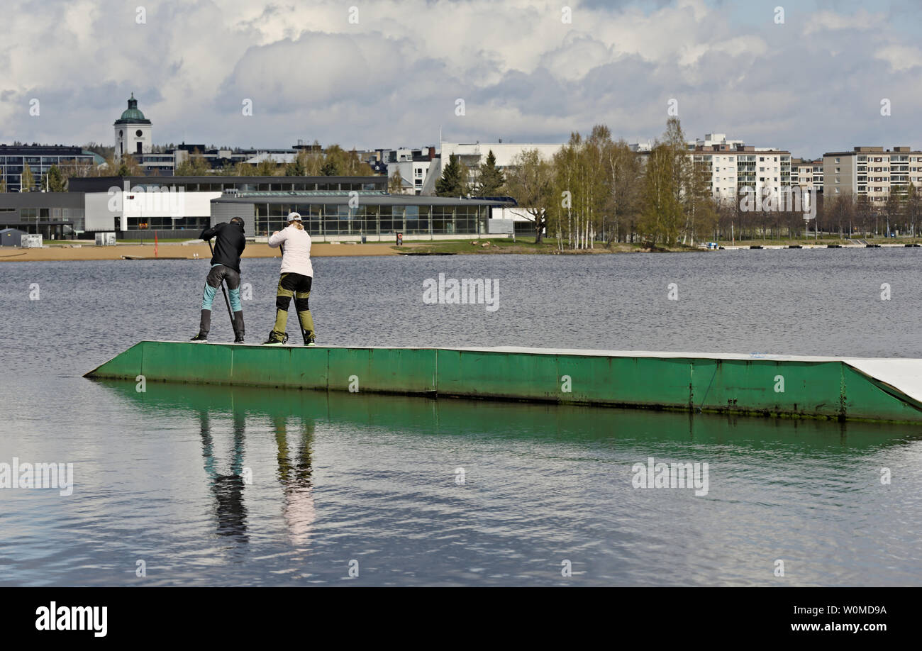 Back of man rowing boat hi-res stock photography and images - Alamy