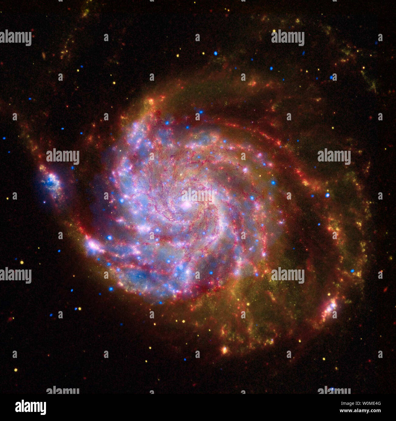 This undated NASA image taken by the Hubble Space Telescope shows spiral galaxy Messier 101 ...