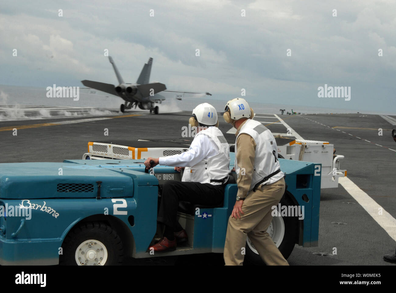 Former U.S. President George H.W. Bush, left, and Capt. Bob Roth ...