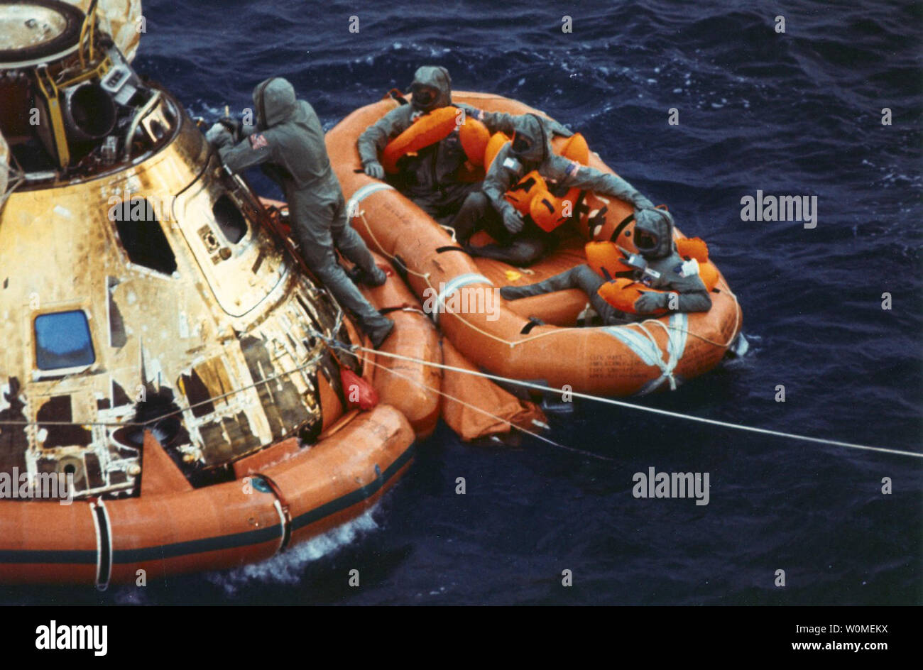 Pararescueman Lt. Clancy Hatleberg closes the Apollo 11 spacecraft ...