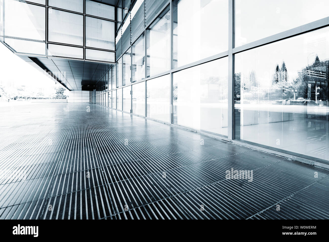 modern building glass wall and empty path Stock Photo - Alamy
