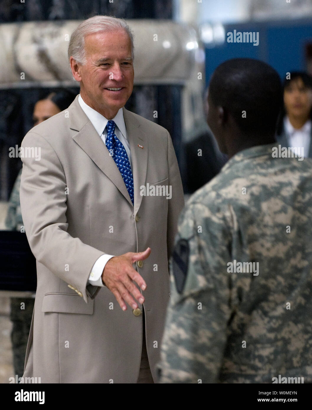 U.S. Vice President Joe Biden congratulates a service member after a ...