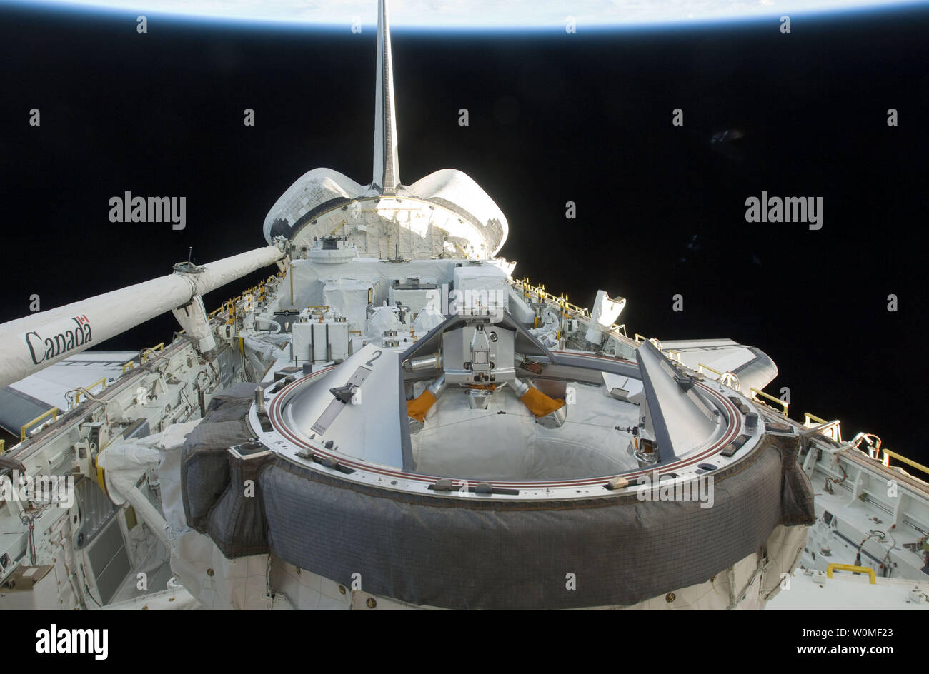 Backdropped by the blackness of space, the Japanese Experiment Module's ...