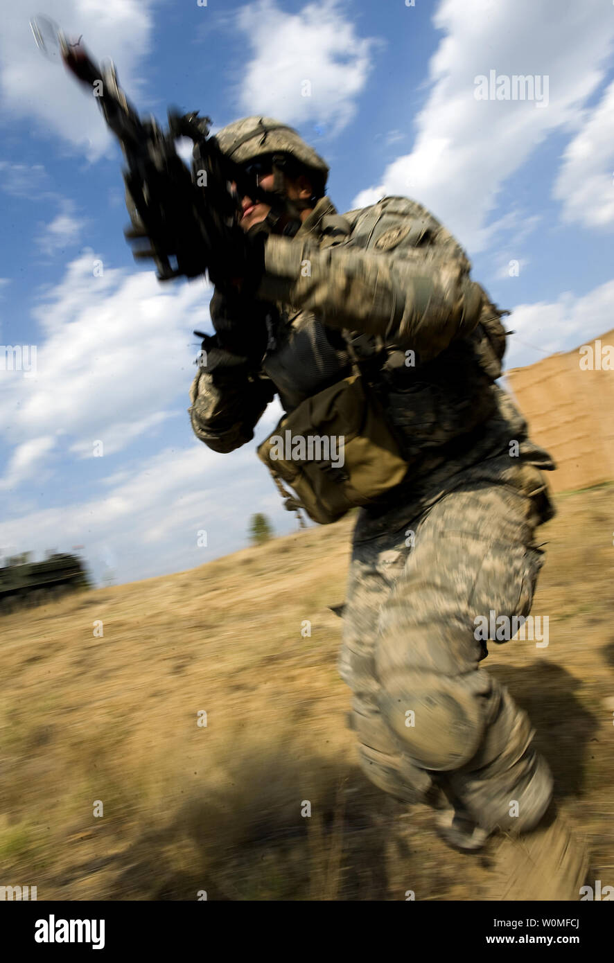 A U.S. Army Soldier from the 2nd Stryker Cavalry Regiment performs ...