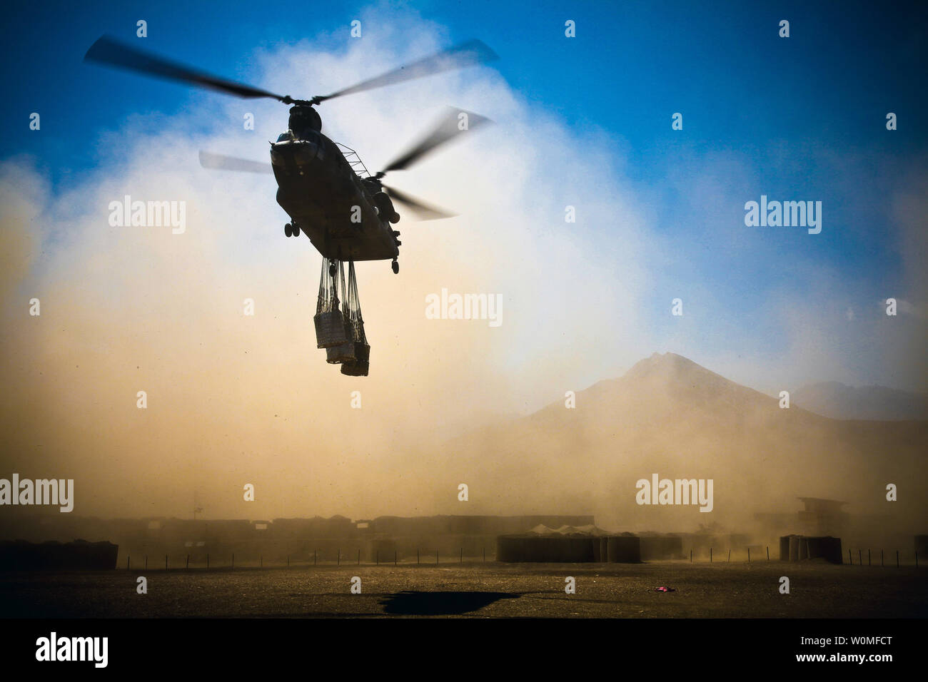 A U.S. Army CH-47 Chinook helicopter approaches the landing zone to ...