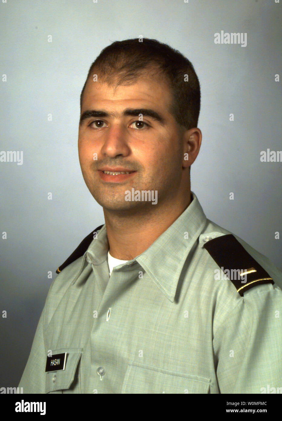 Maj. Nidal Malik Hasan, is shown in a 2000 file photo from the ...
