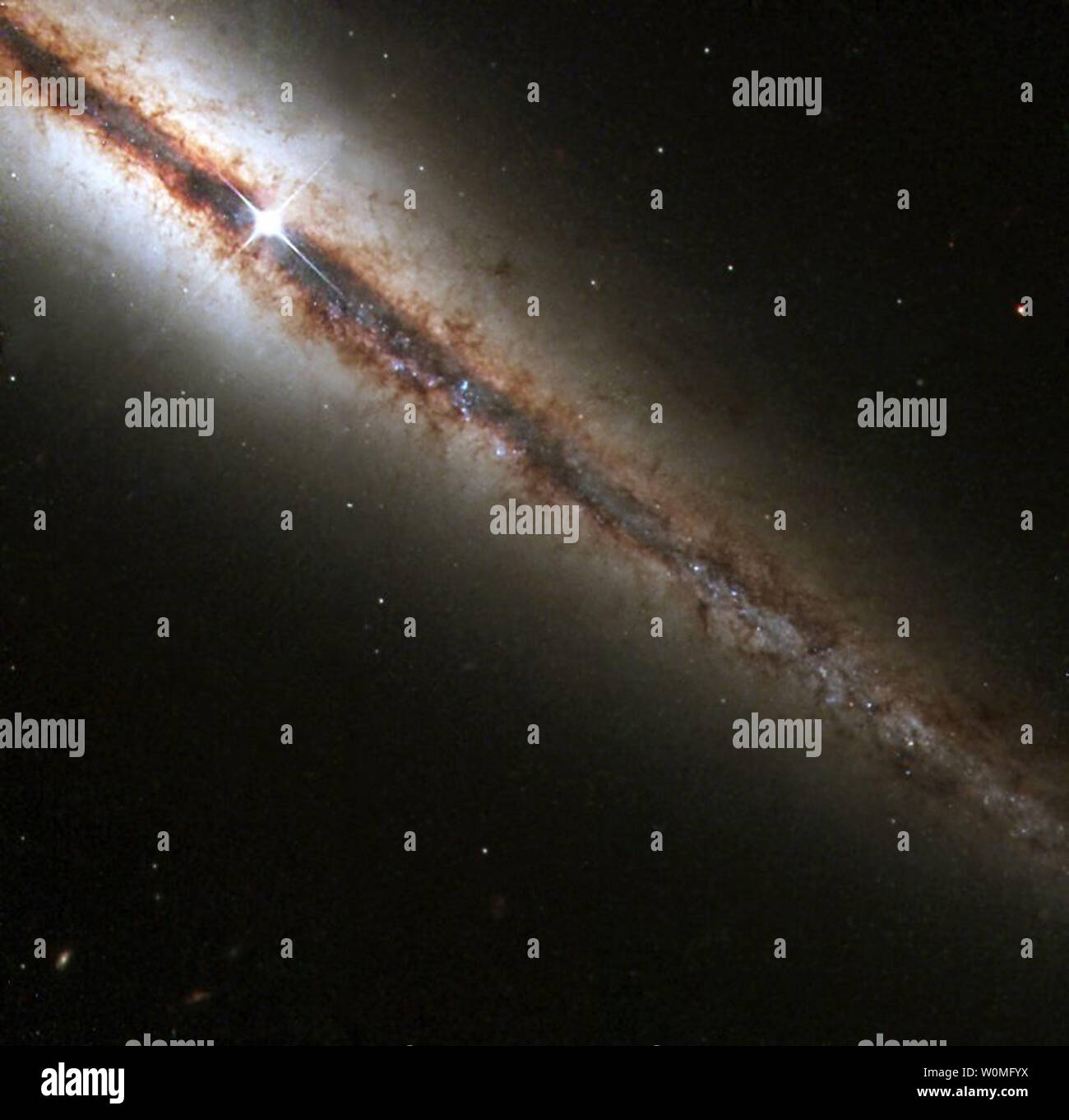 This March 1, 2001 NASA image shows spiral galaxy NGC 4013. UPI/NASA ...