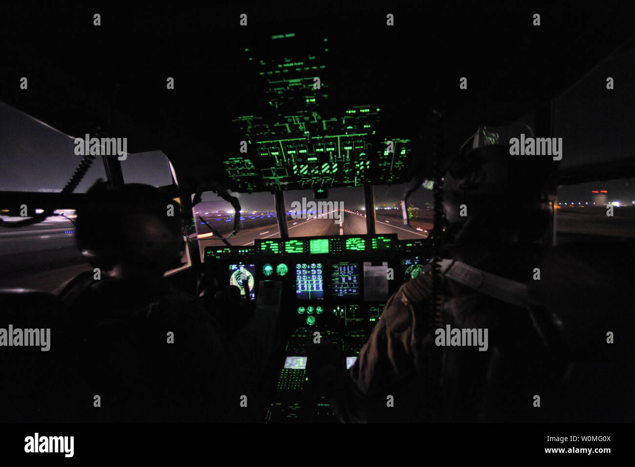 Capt. Dave Paland, (L) and Canadian Capt. Ryan Peters, both 772nd ...