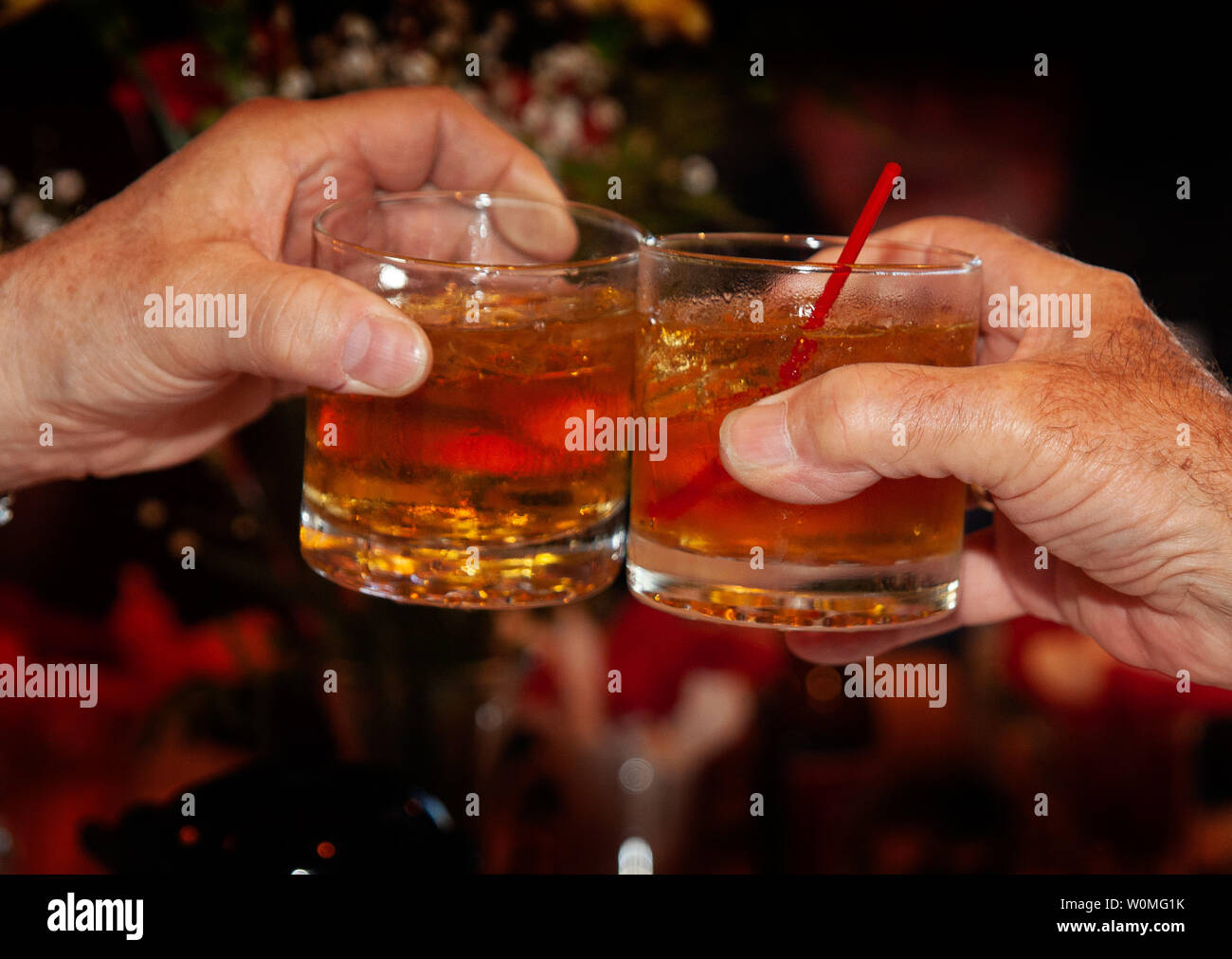 Old friends toast the past and the future Stock Photo - Alamy