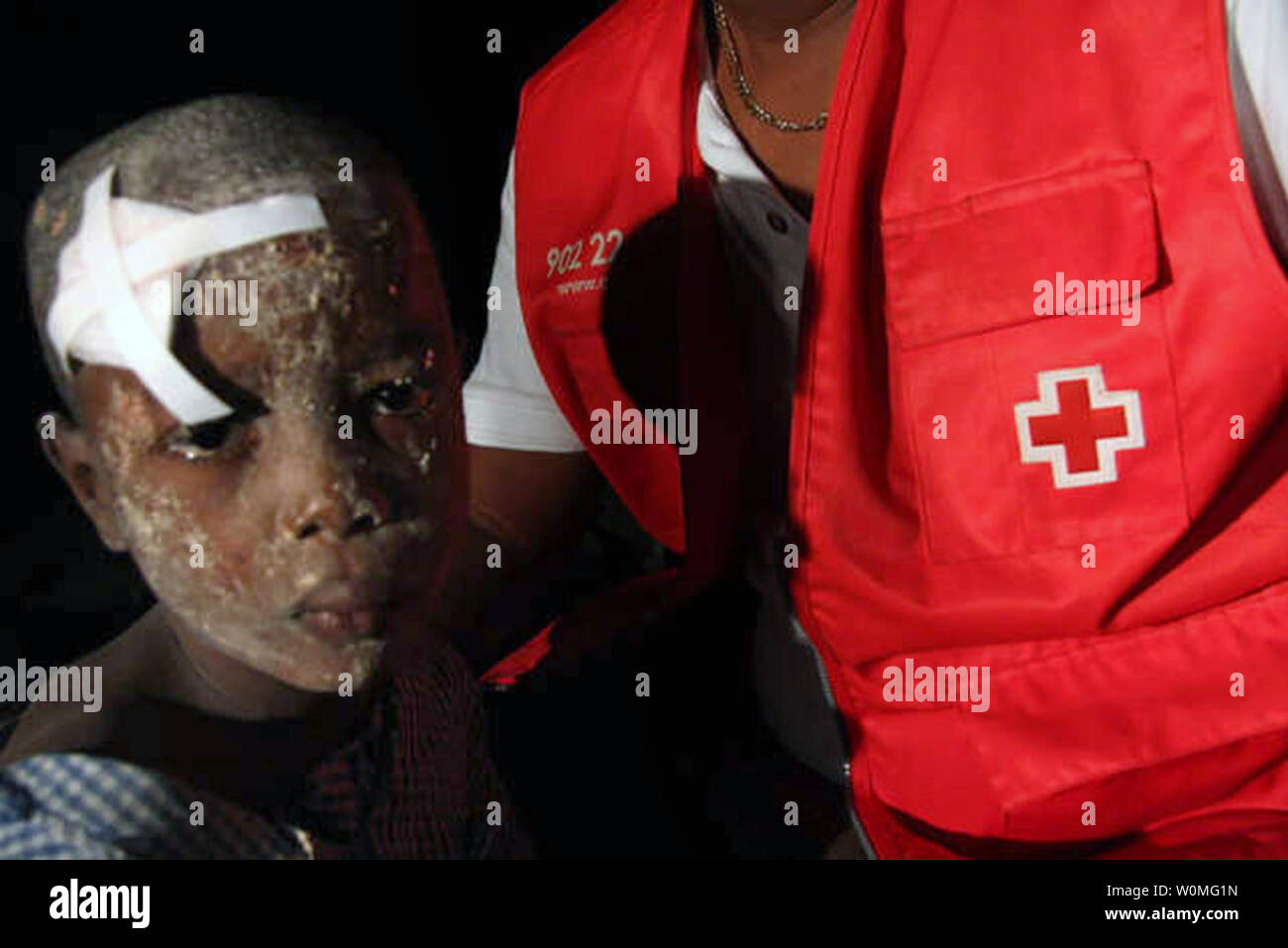 Red cross boy earthquake hi-res stock photography and images - Alamy