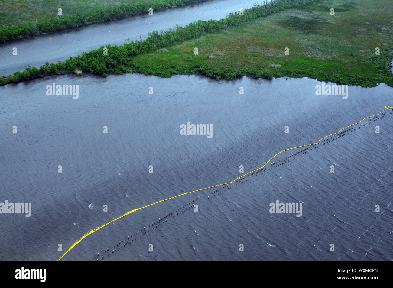 Protective boom lines the Louisiana coast on May 1, 2010, after the ...