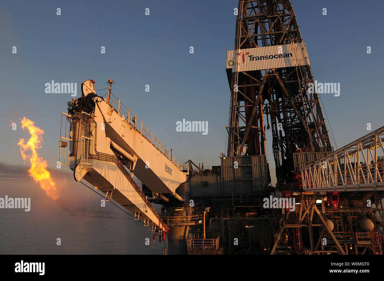 Gas from the damaged Deepwater Horizon wellhead is burned by the ...