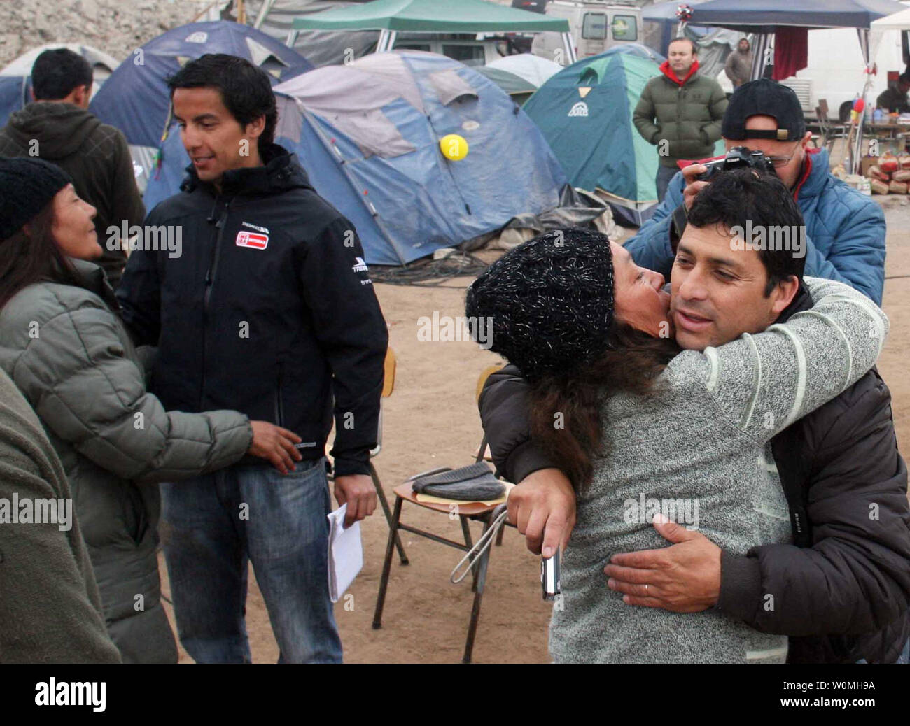 Family members of the 33 miners trapped since August 5 at San Jose Mine ...