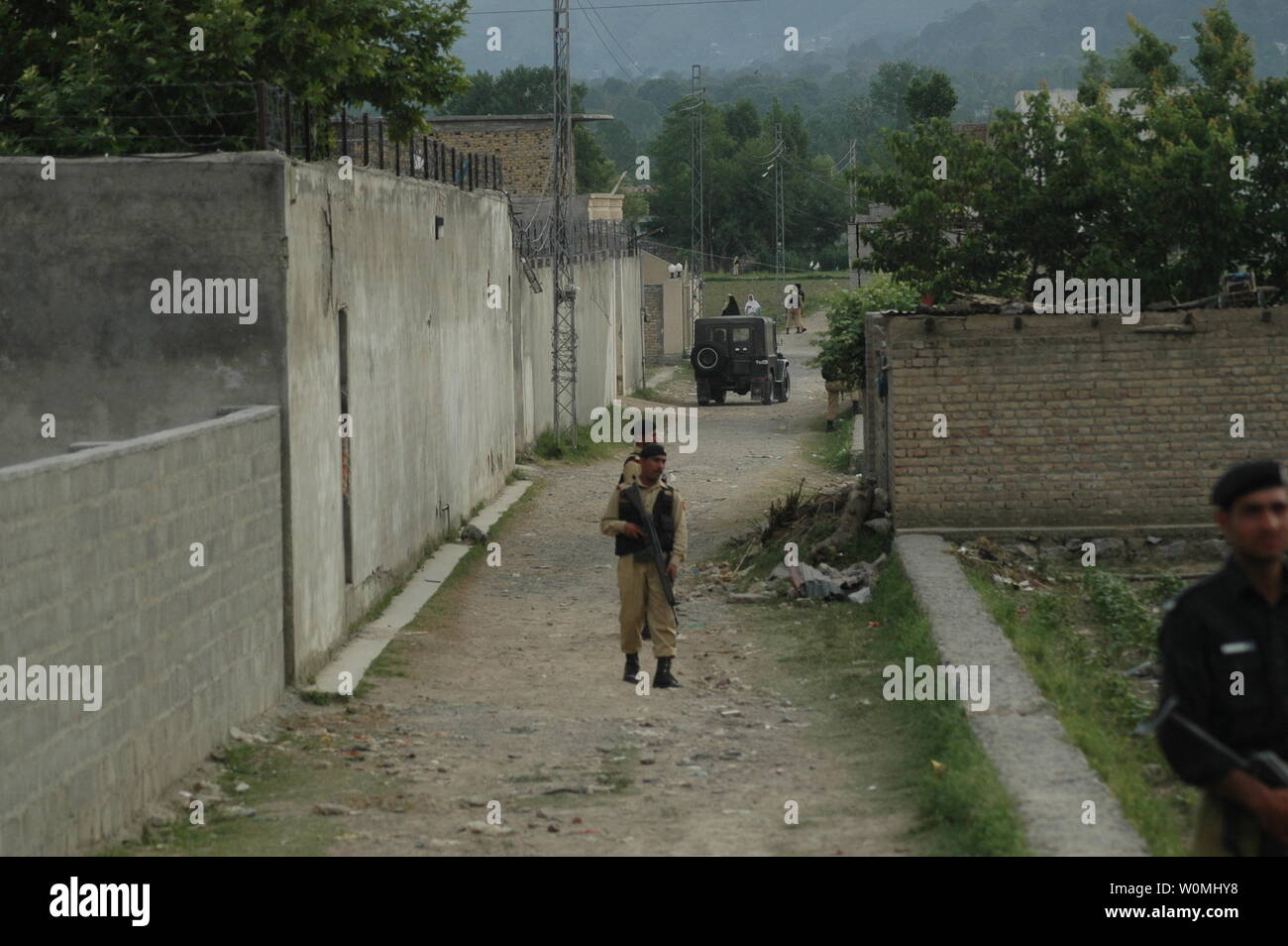 Pakistan Army soldiers guard Osama bin Laden's compound in Abbottabad ...