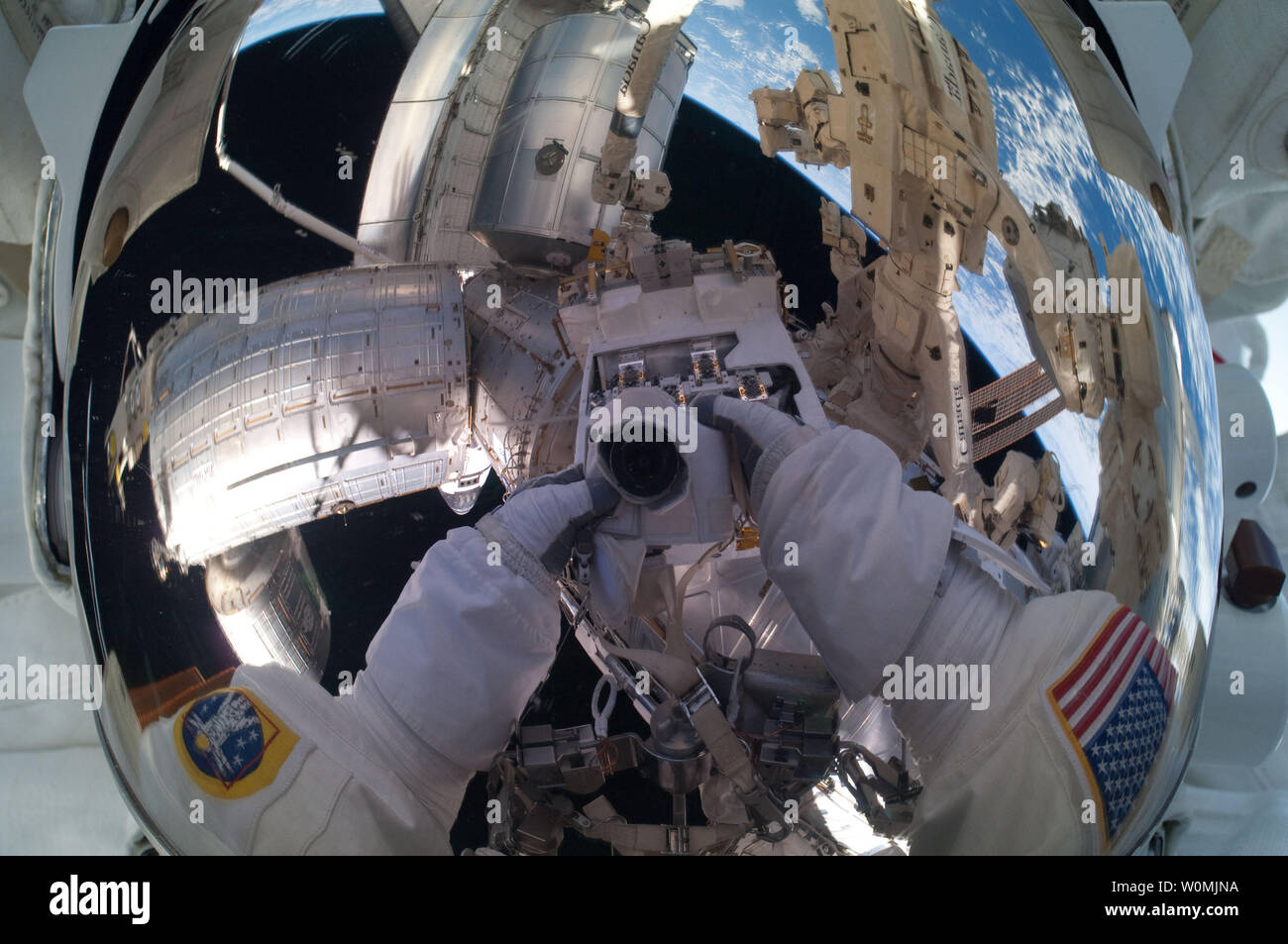 This NASA self portrait taken on July 12, 2011 by NASA astronaut Mike ...