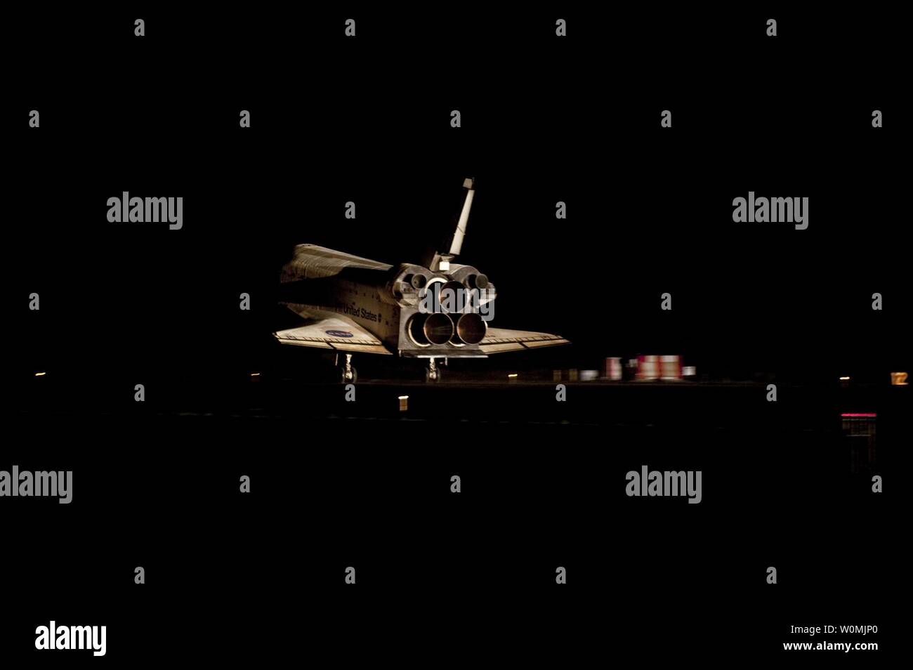 Space shuttle Atlantis (STS-135) touches down at NASA's Kennedy Space Center Shuttle Landing ...