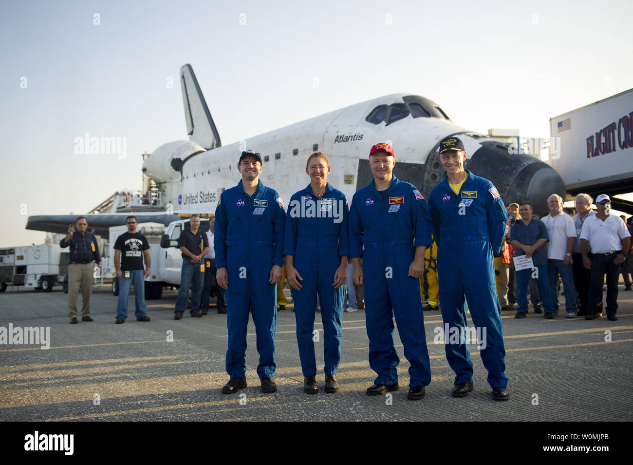 The STS-135 astronauts, from left, Mission Specialists Rex Walheim ...