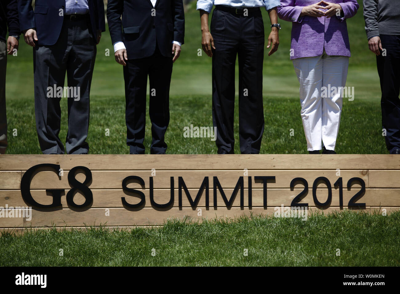 G8 leaders pose for a group photo during the 2012 G8 Summit at Camp ...