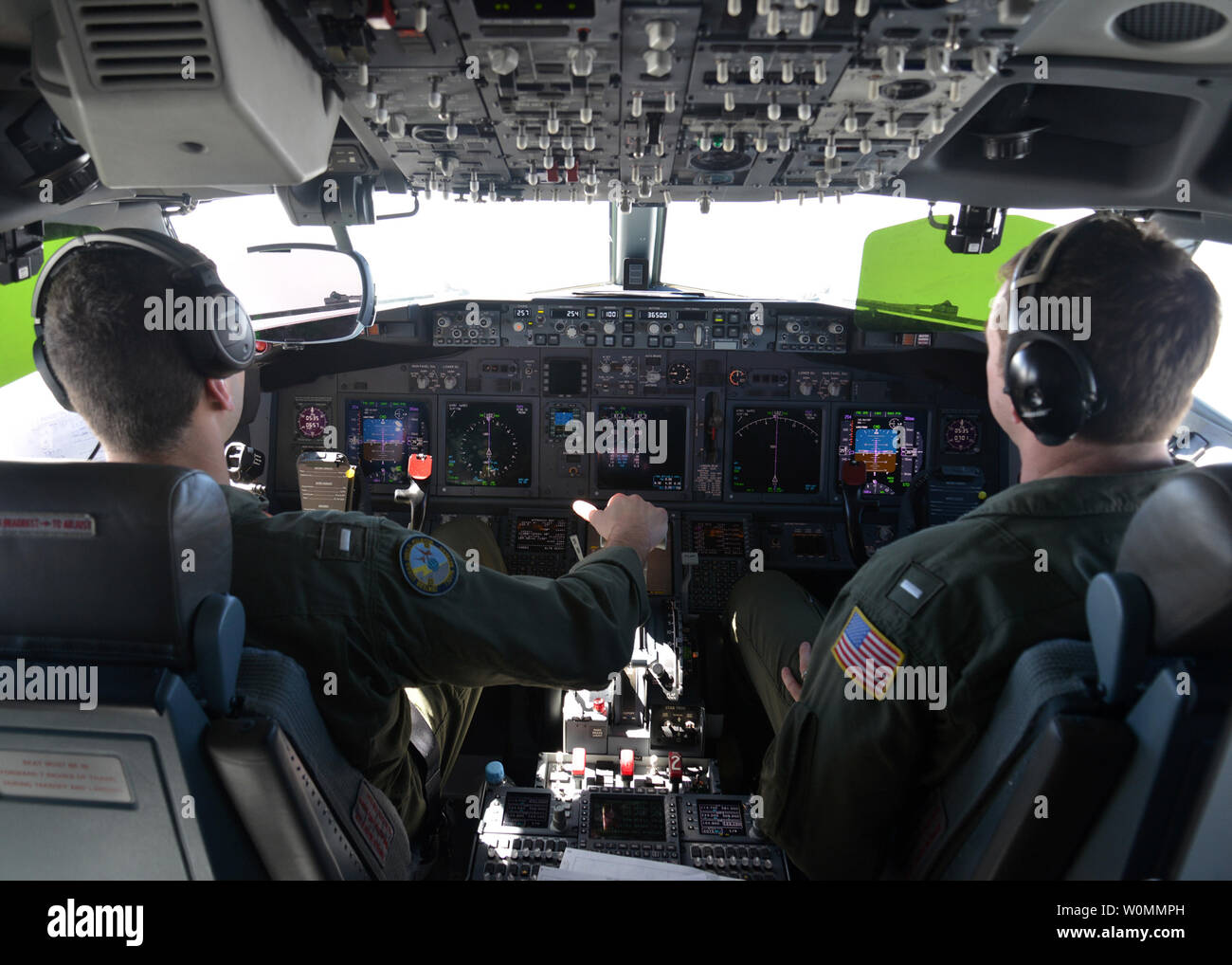 U.S. Naval aviator Lt. Kyle Atakturk (L) and Lt. Nicholas Horton pilot ...