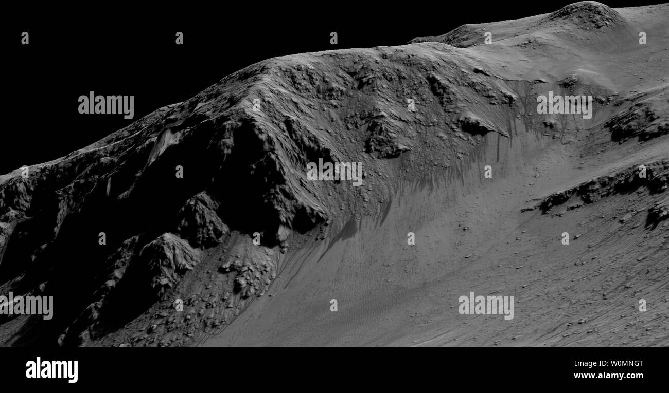 The dark, narrow streaks flowing downhill on Mars at sites such as this ...