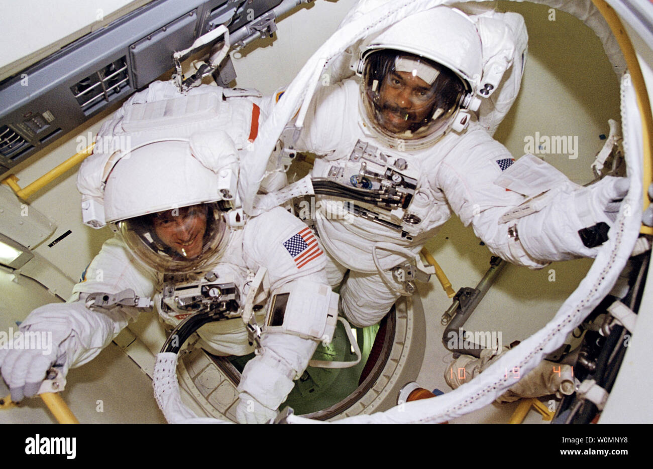 STS-63 astronauts Bernard A. Harris, Jr., payload commander (right ...