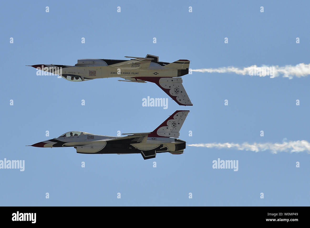 The Thunderbirds solo pilots perform the Calypso Pass during the March ...