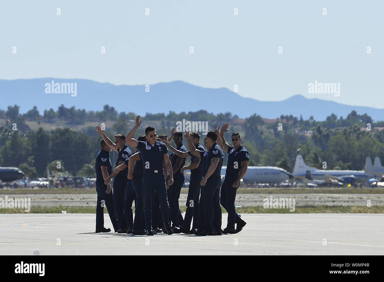 Thunderbirds show line members wave to the crowd after the ground show ...