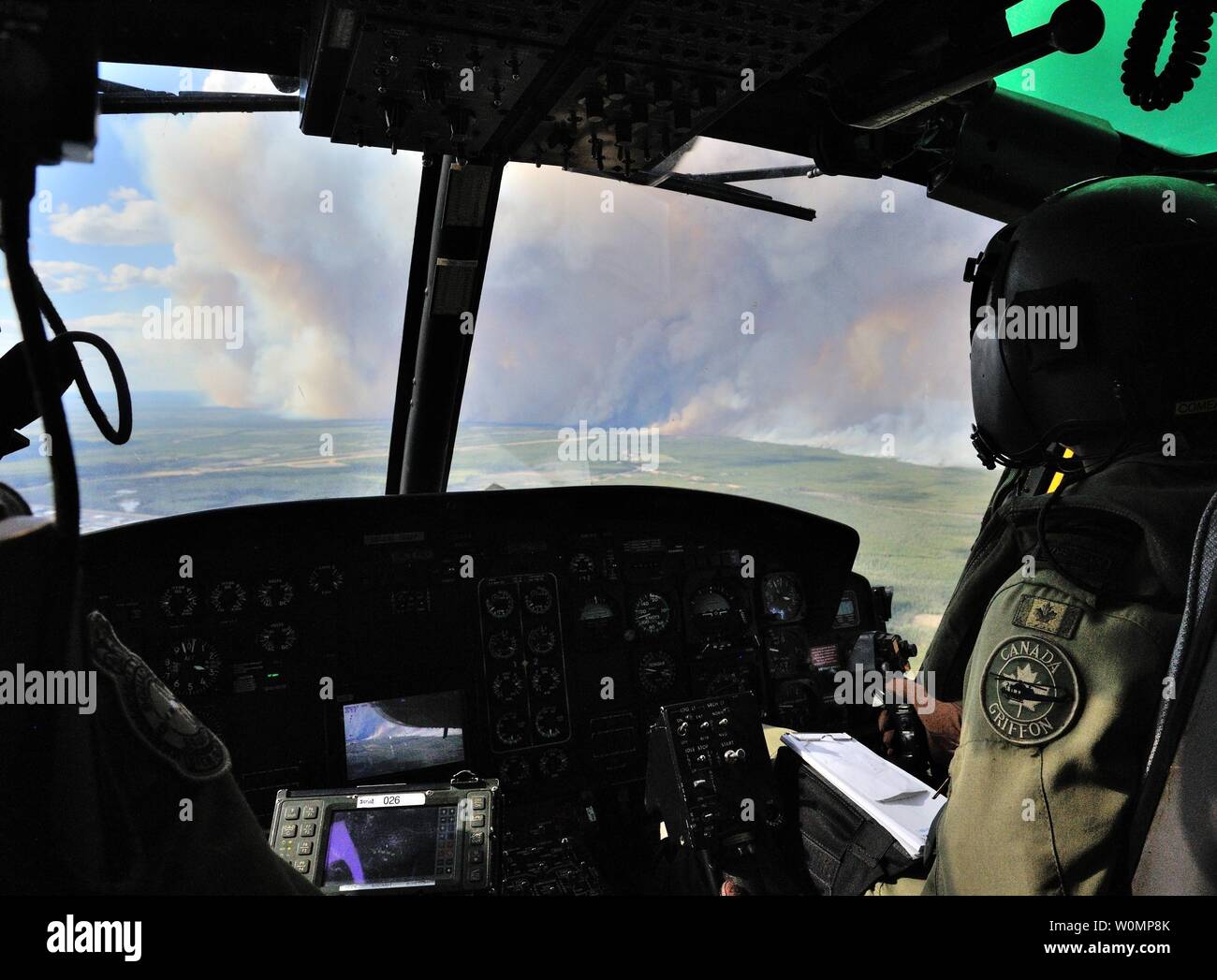 Members from 408 Tactical Helicopter Squadron, Edmonton fly a CH-146 ...