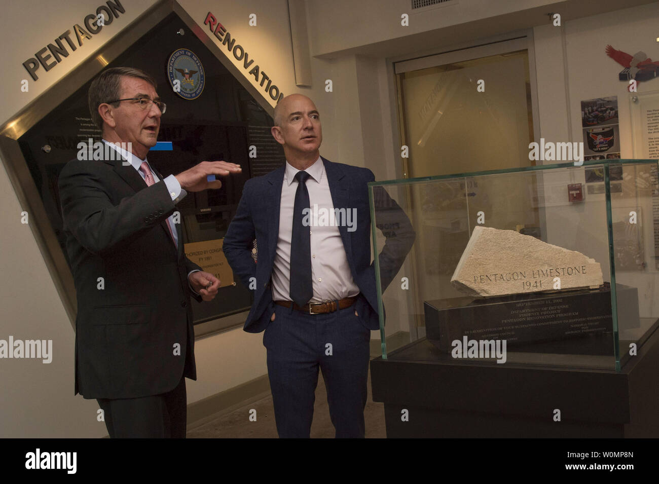 Secretary of Defense Ash Carter gives Amazon CEO Jeff Bezos a tour of ...