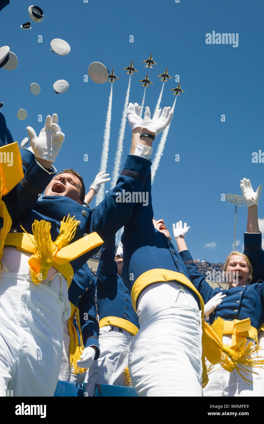 Hats go skyward as the U.S. Air Force Thunderbirds fly over the U.S ...
