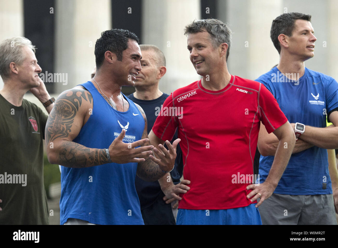 Crown Prince Frederik of Denmark, front right, speaks with U.S. Air ...
