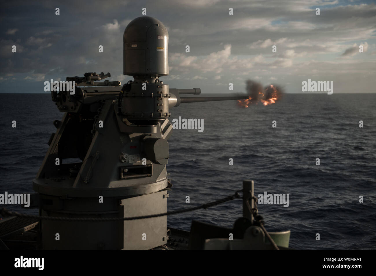 The USS Ronald Reagan (CVN 76), conducts a live-fire exercise of its MK ...