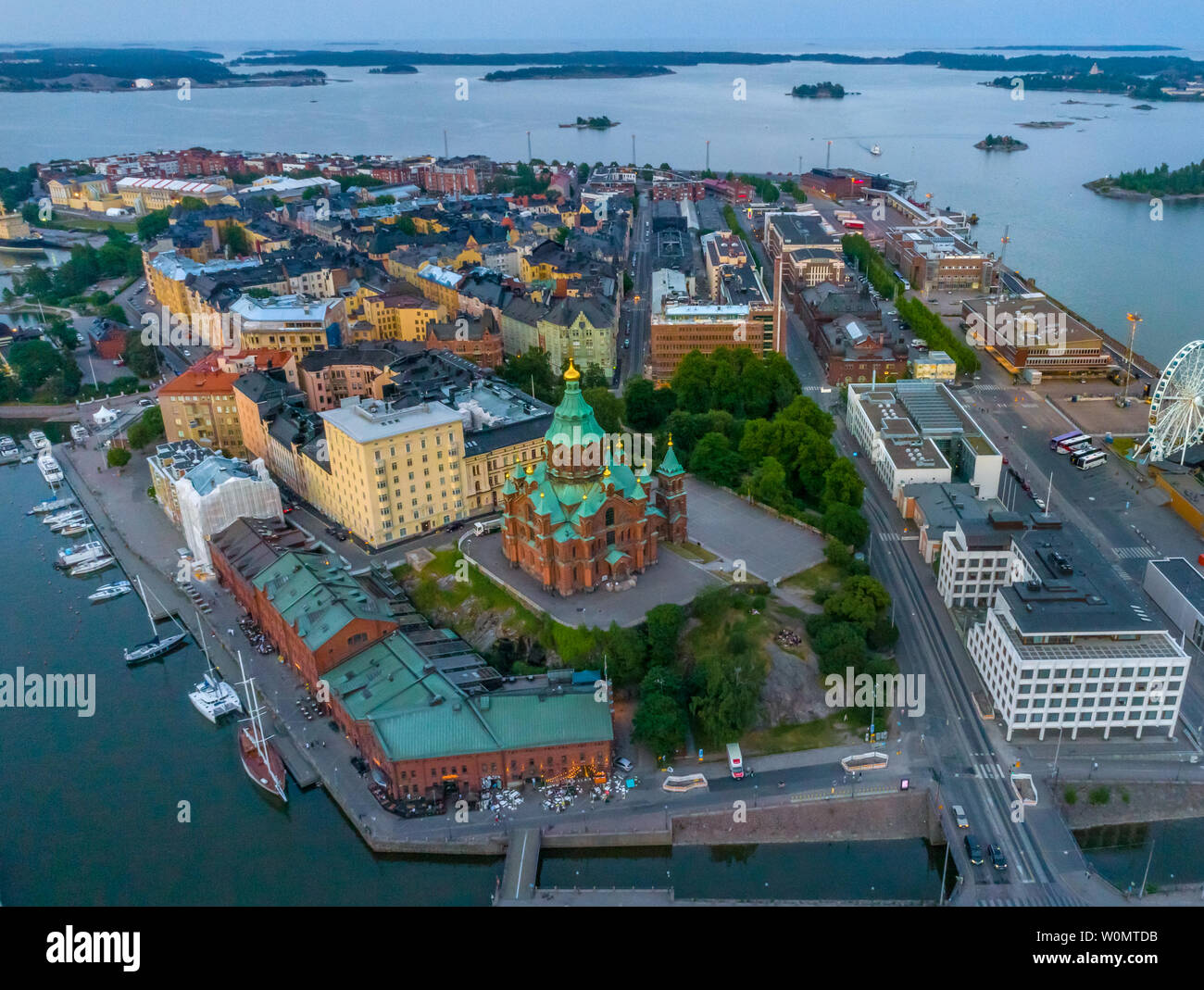 Aerial view of beautiful Helsinki at sunset. Blue sky and clouds and ...