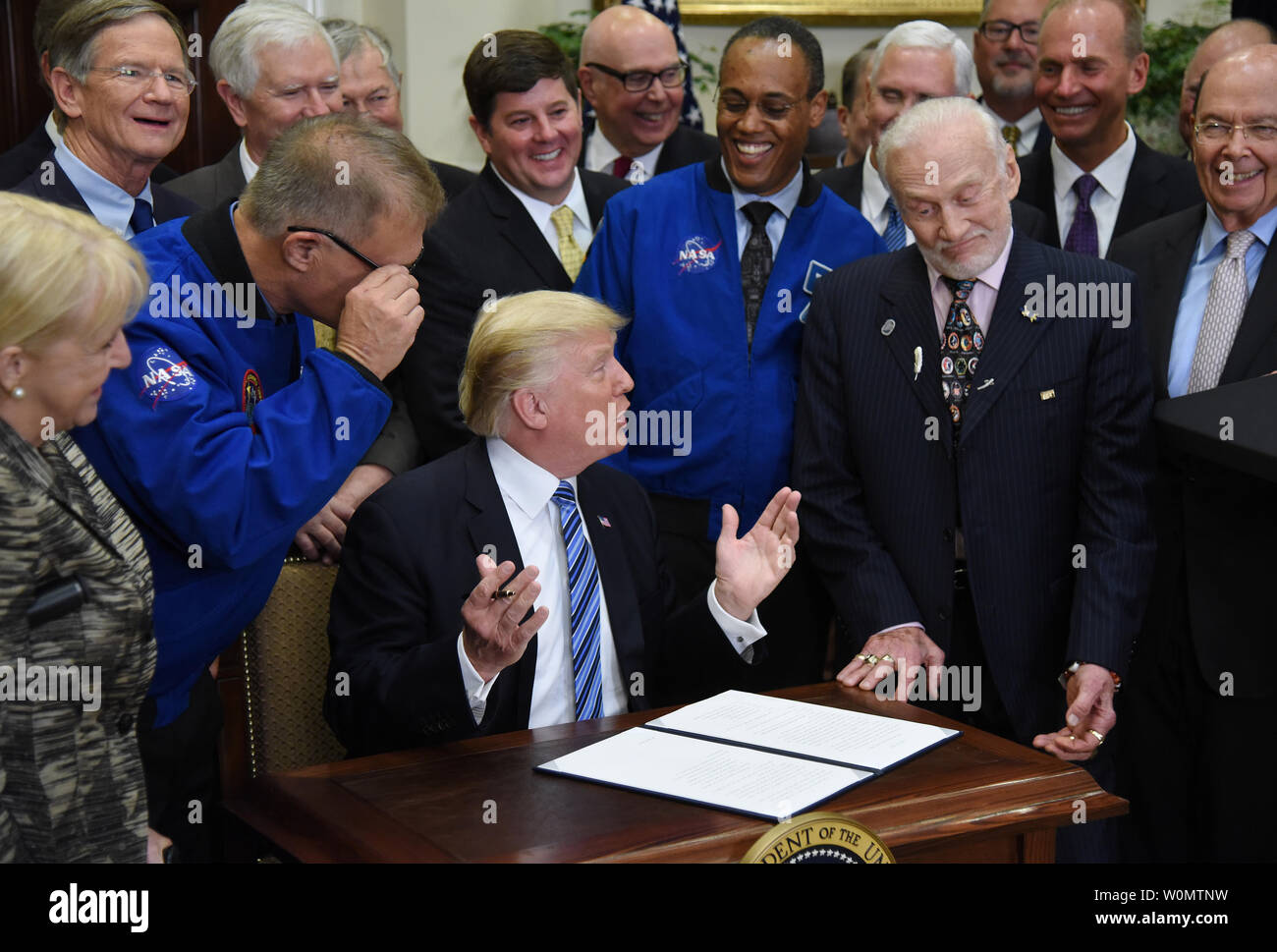 U.S President Donald Trump signs an Executive Order to reestablish the ...
