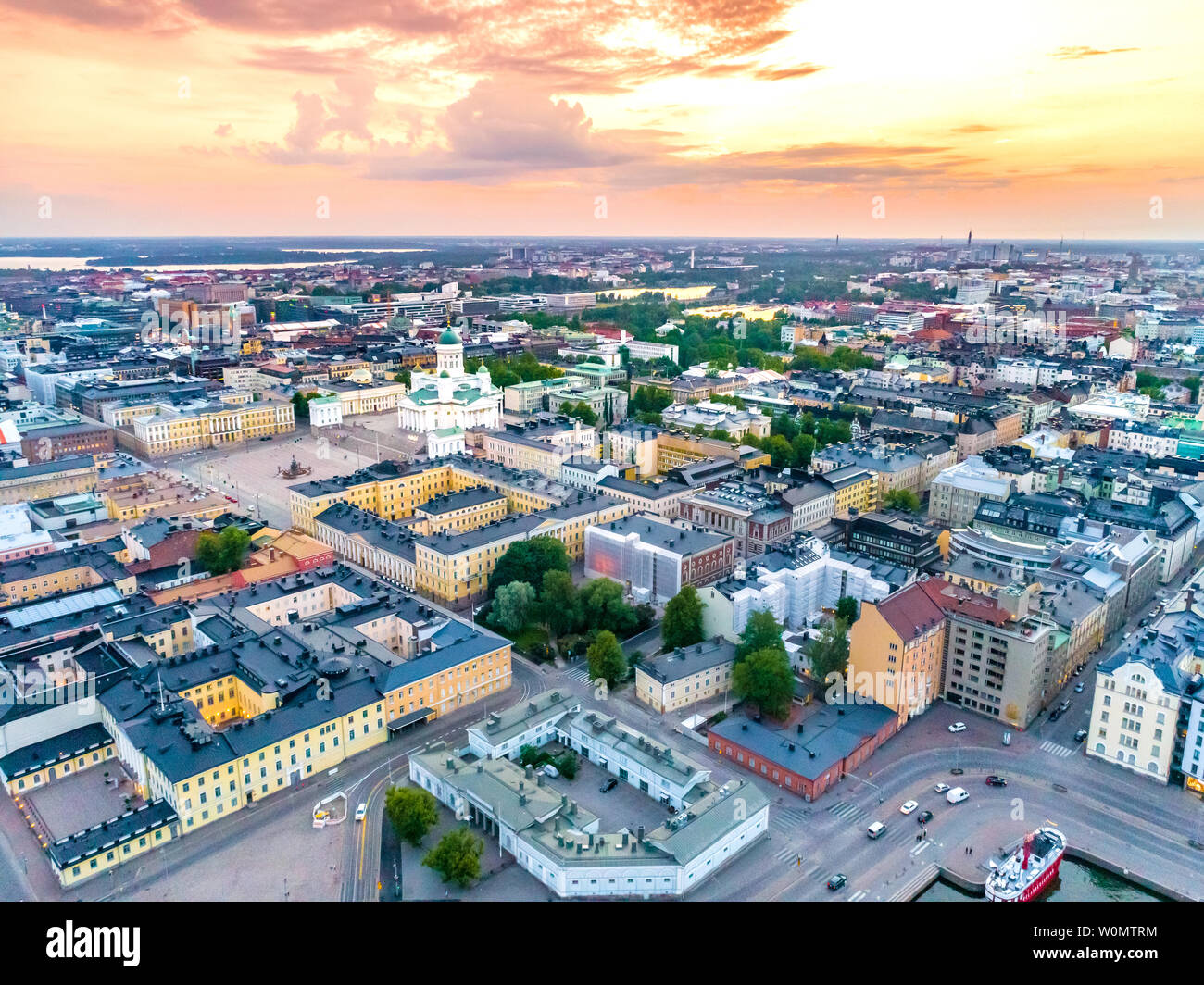 Aerial view of beautiful Helsinki at sunset. Blue sky and clouds and ...