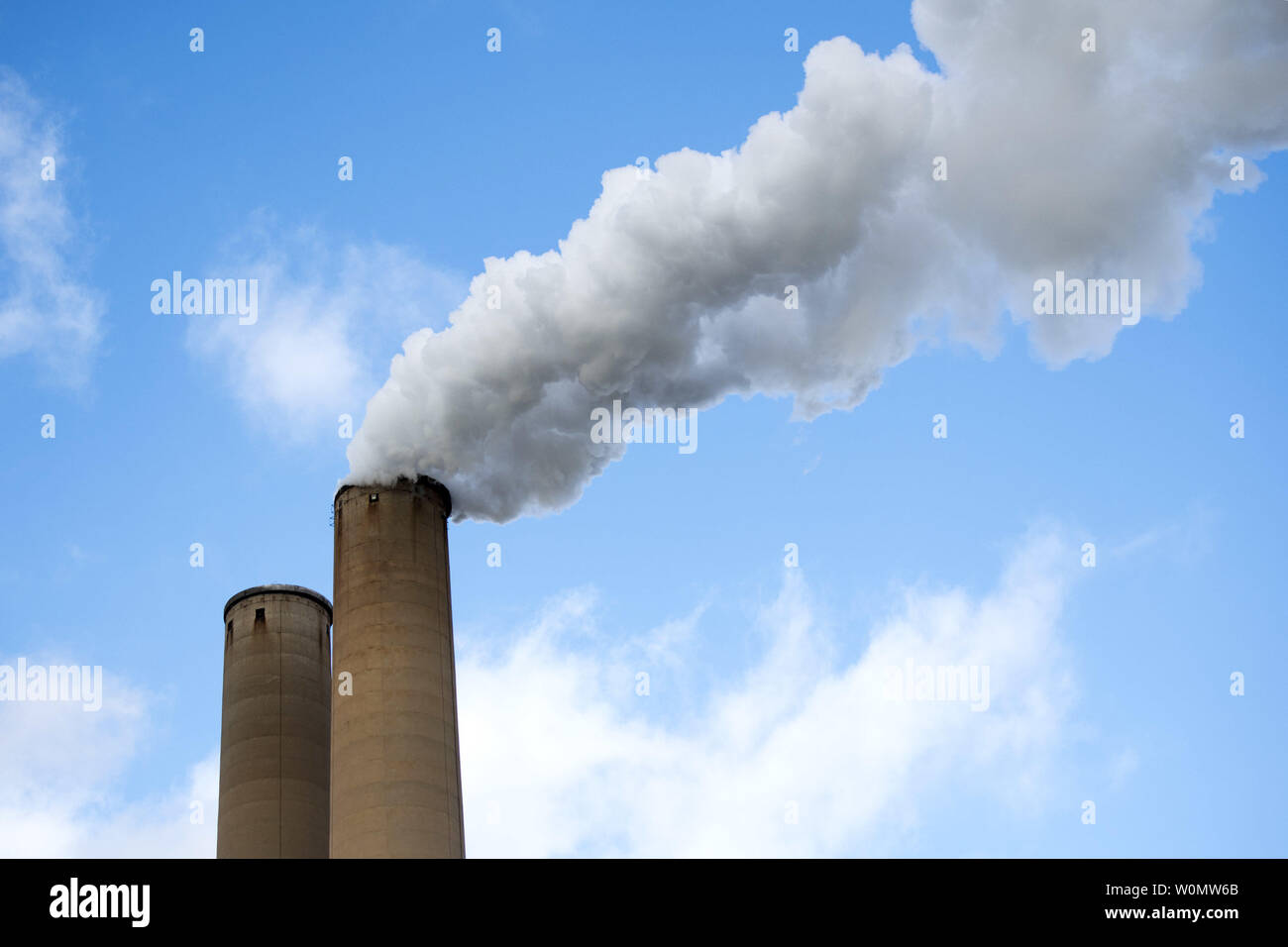 Steam rises from a smoke stack at the Big Bend Power Station coal-fired ...