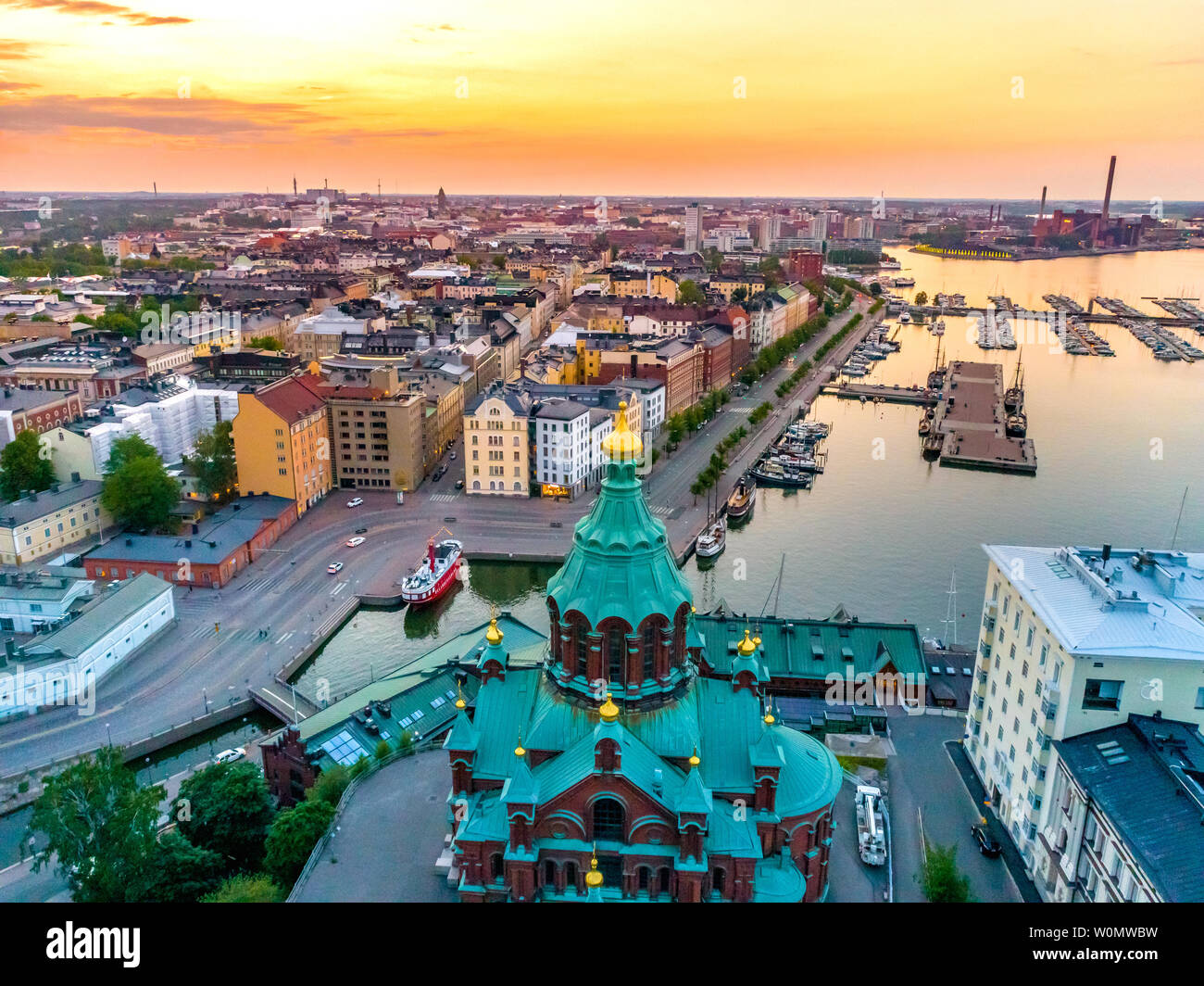 Aerial view of beautiful Helsinki at sunset. Blue sky and clouds and ...