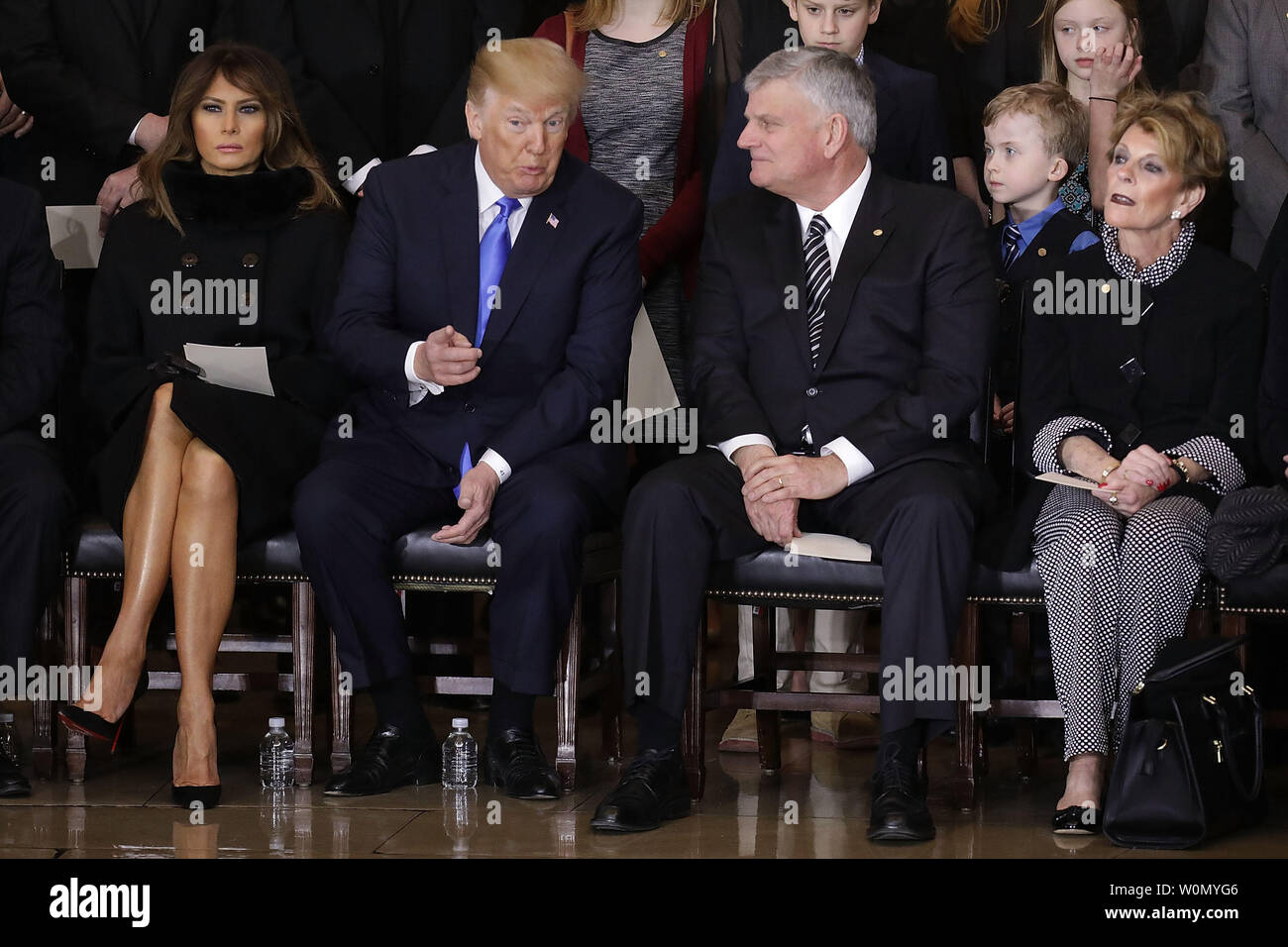 (L-R) First lady Melania Trump, U.S. President Donald Trump, Rev. Billy ...