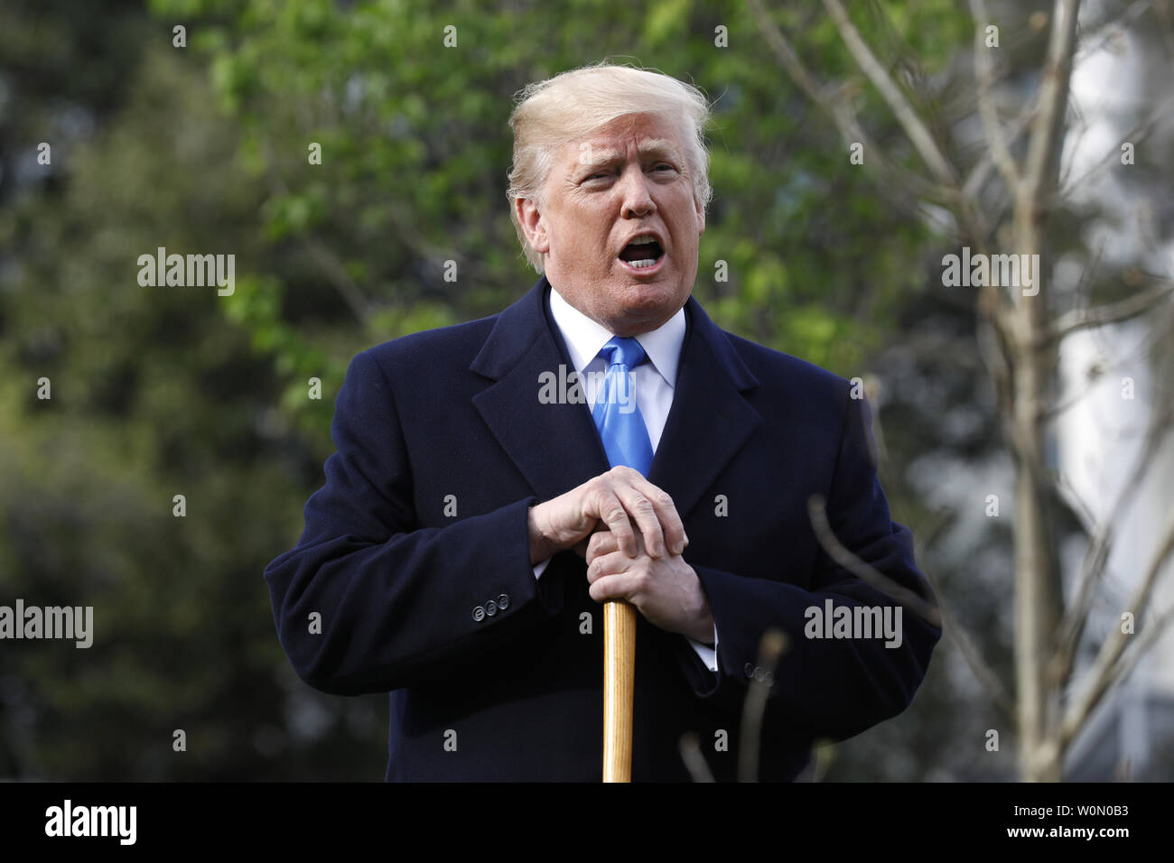 U.S. President Donald Trump participates in a tree planting, a gift ...