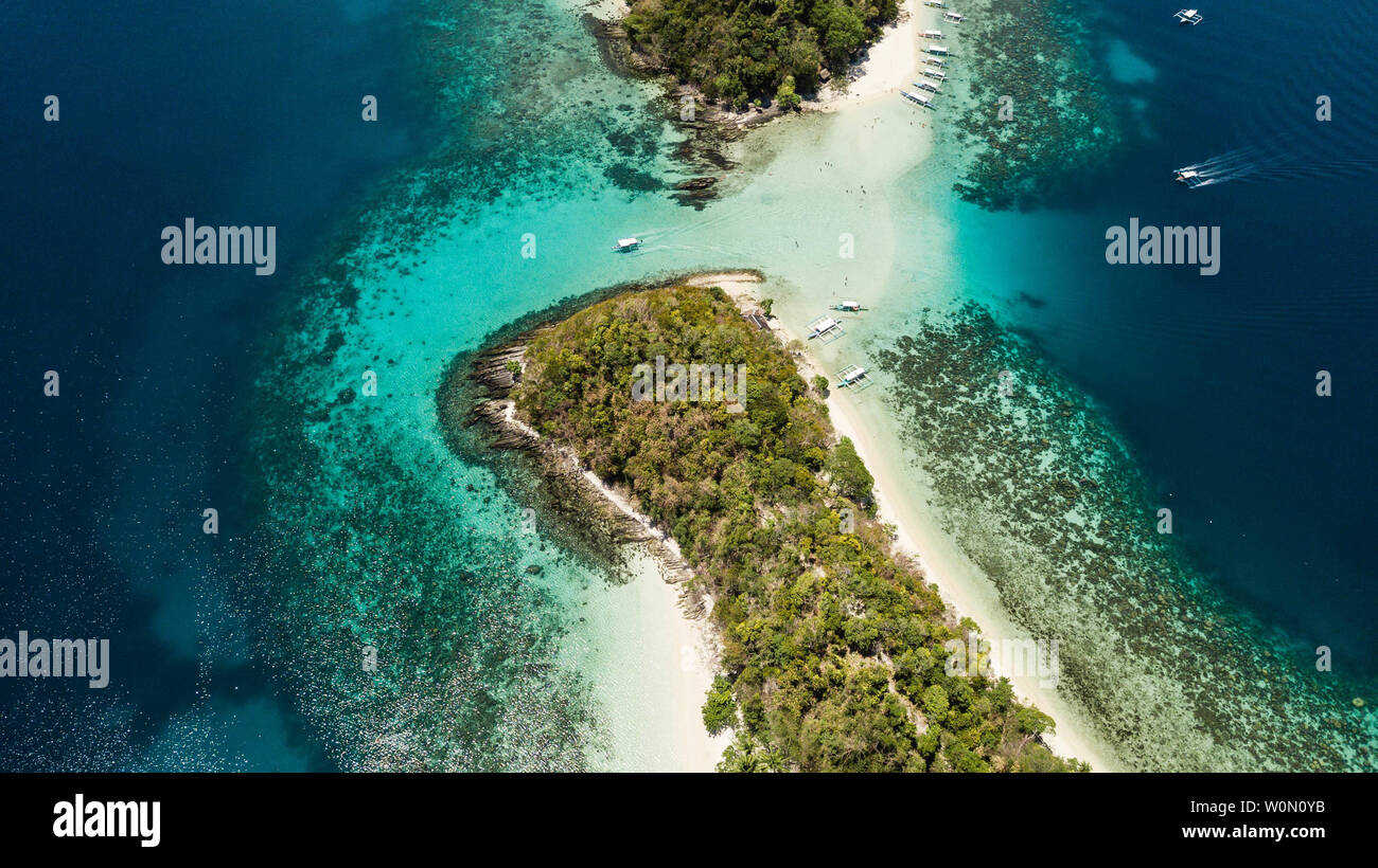 Top view of small tropical island in the Philippines. Island hopping ...