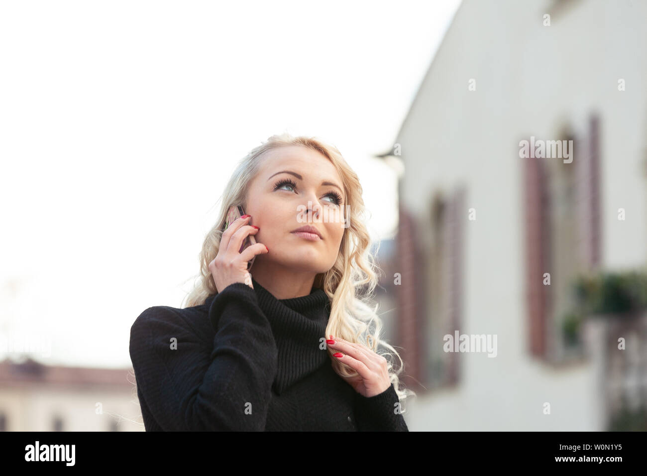 Black woman listening intently hi-res stock photography and images - Alamy