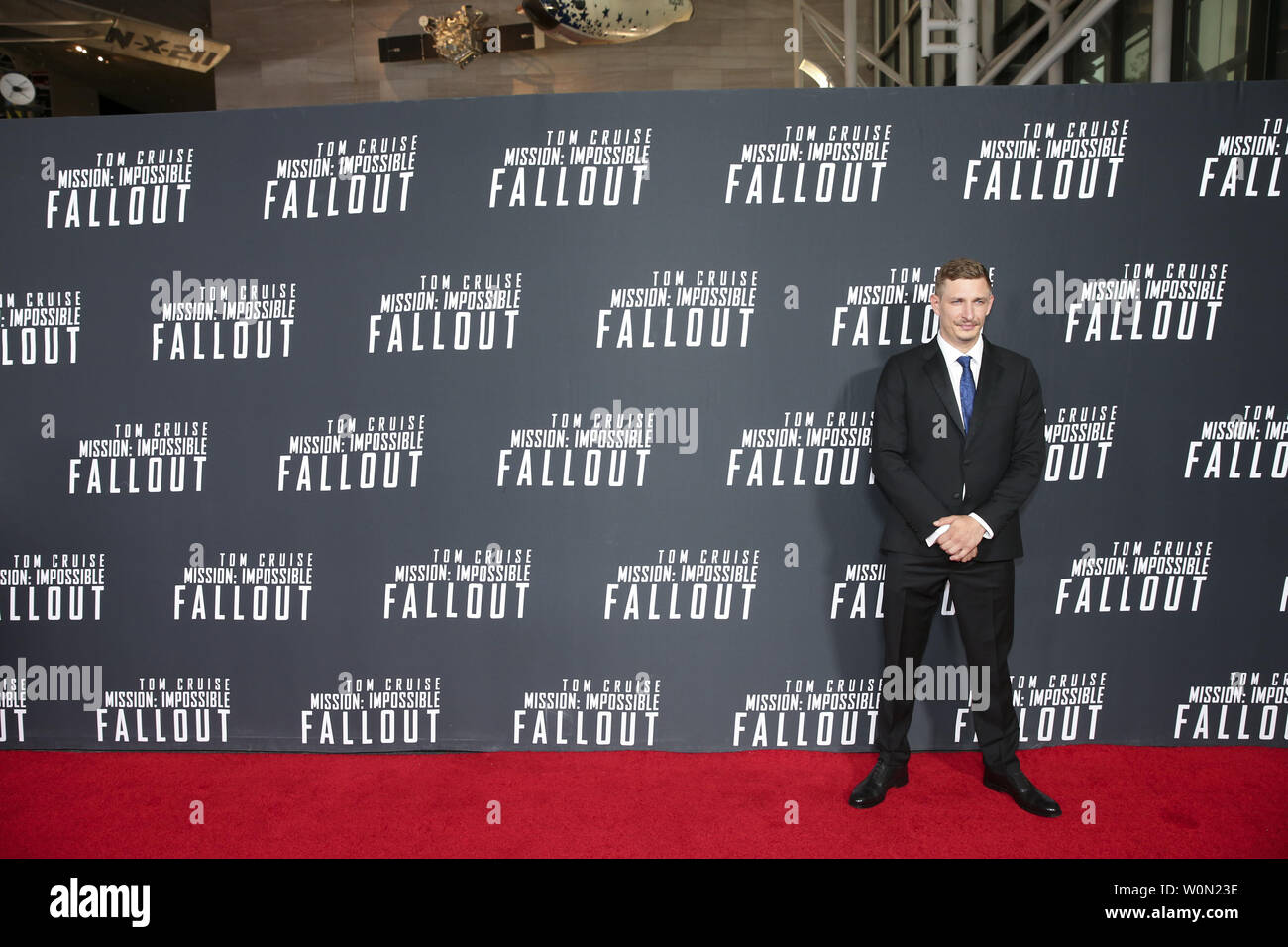 Frederick Schmidt arrives on the red carpet at the 'Mission: Impossible ...