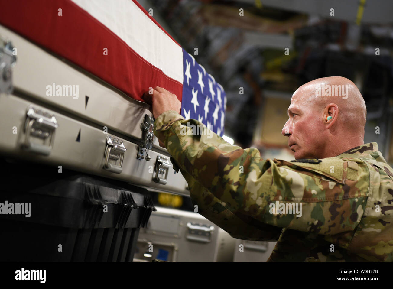 U.S. Army Sgt. 1st Class Eric Feltz, mortuary affairs specialist ...