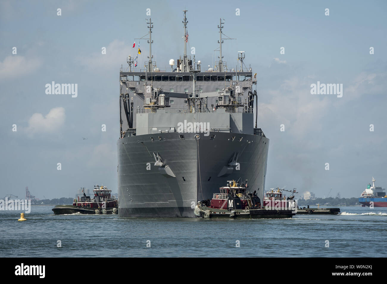 The Military Sealift Command dry cargo and ammunition ship USNS Lewis ...