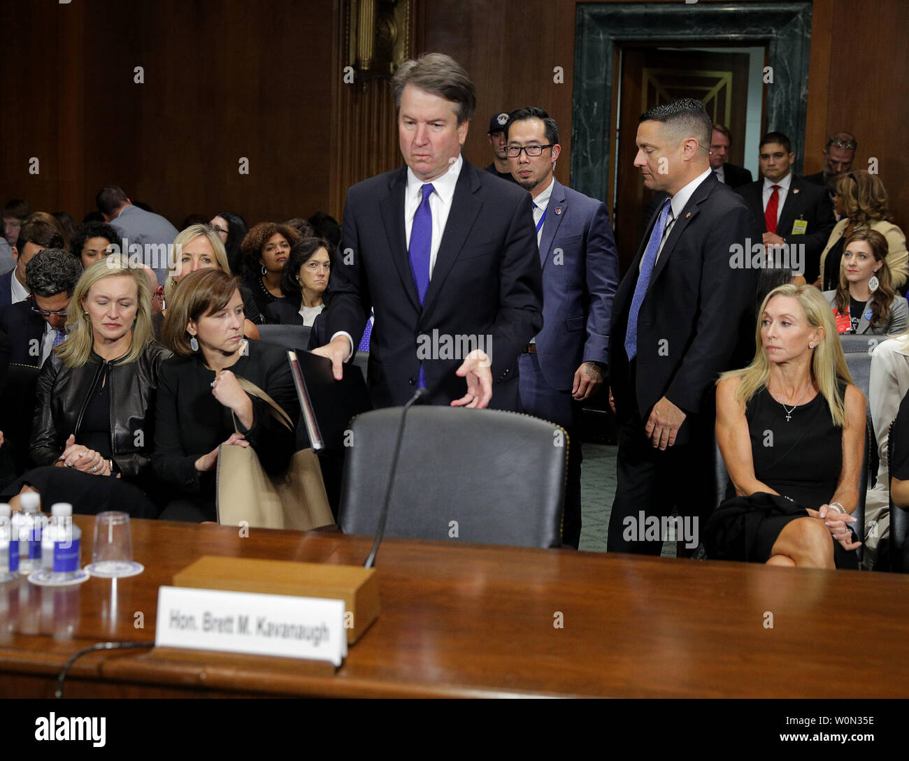 U.S. Supreme Court nominee Brett Kavanaugh takes his seat as he arrives ...