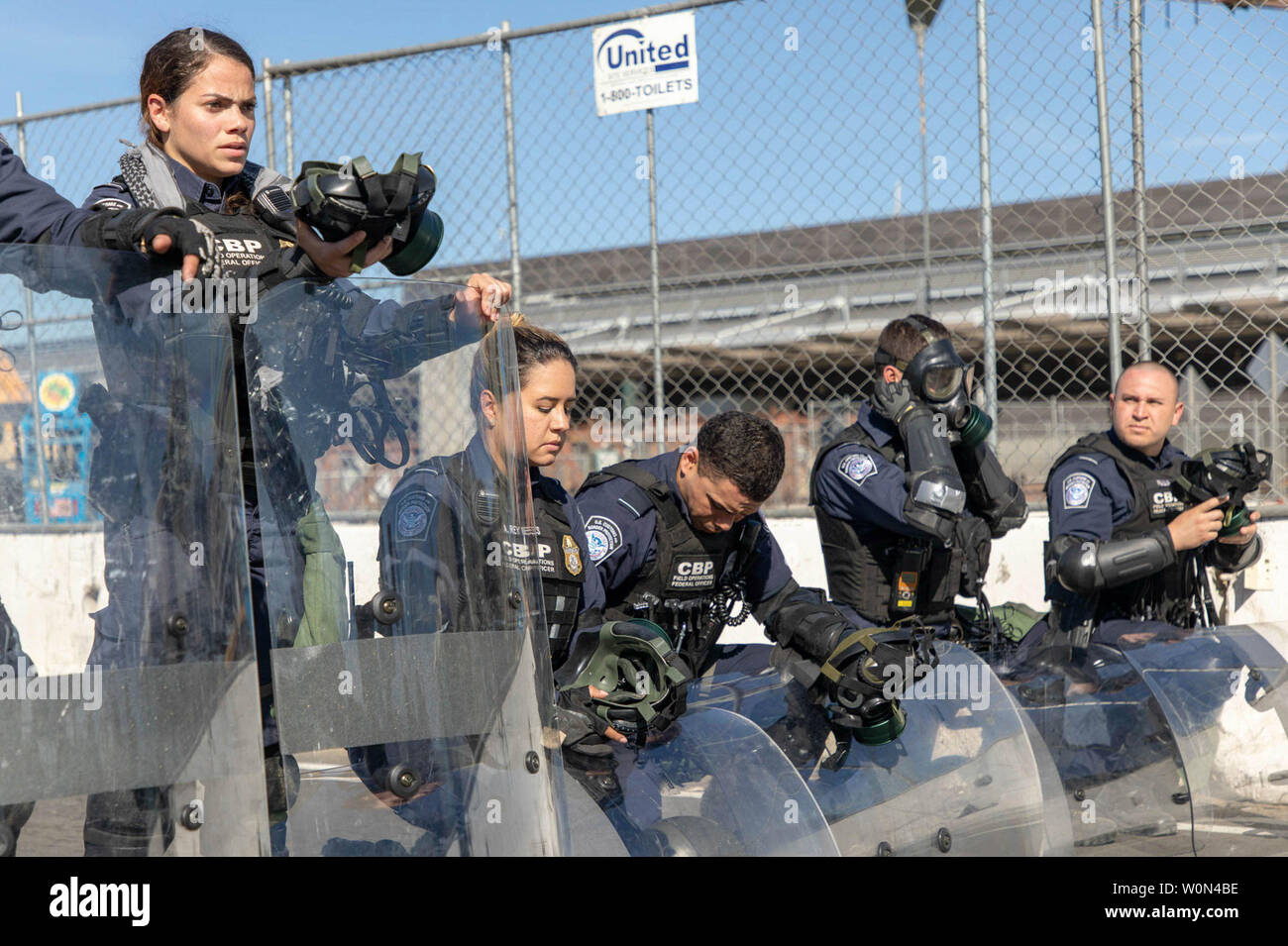 U.S. Customs and Border Protection (CBP) agents along with Department ...