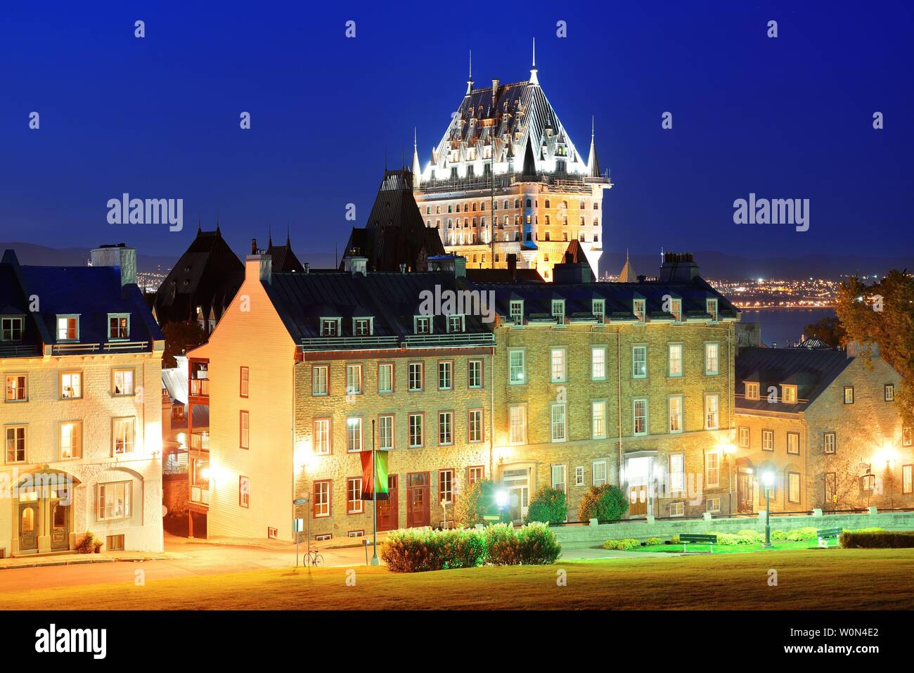Quebec City old buildings with Chateau Frontenac at dusk Stock Photo ...