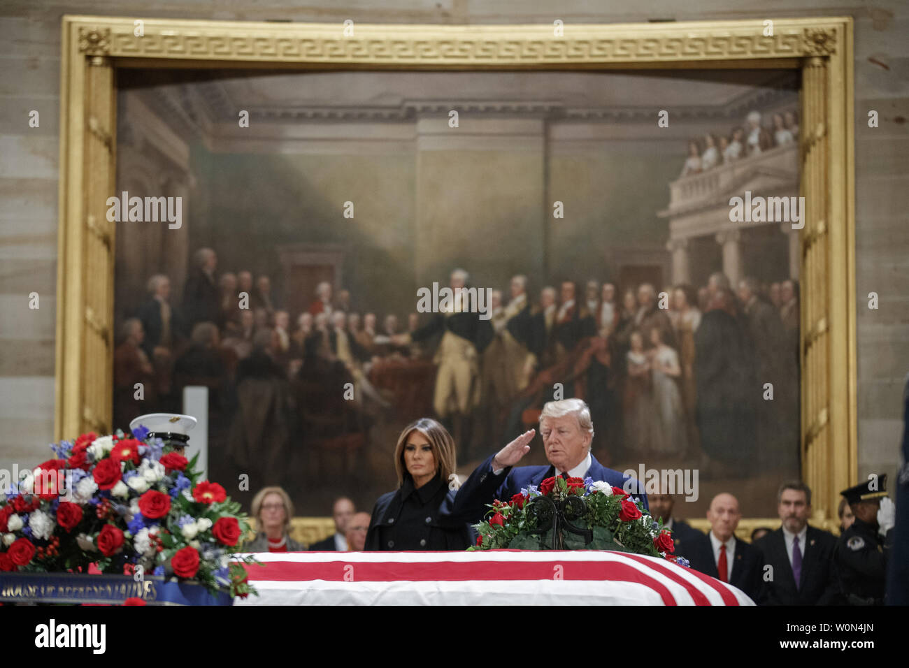 US President Donald J. Trump, with First Lady Melania Trump, salutes ...