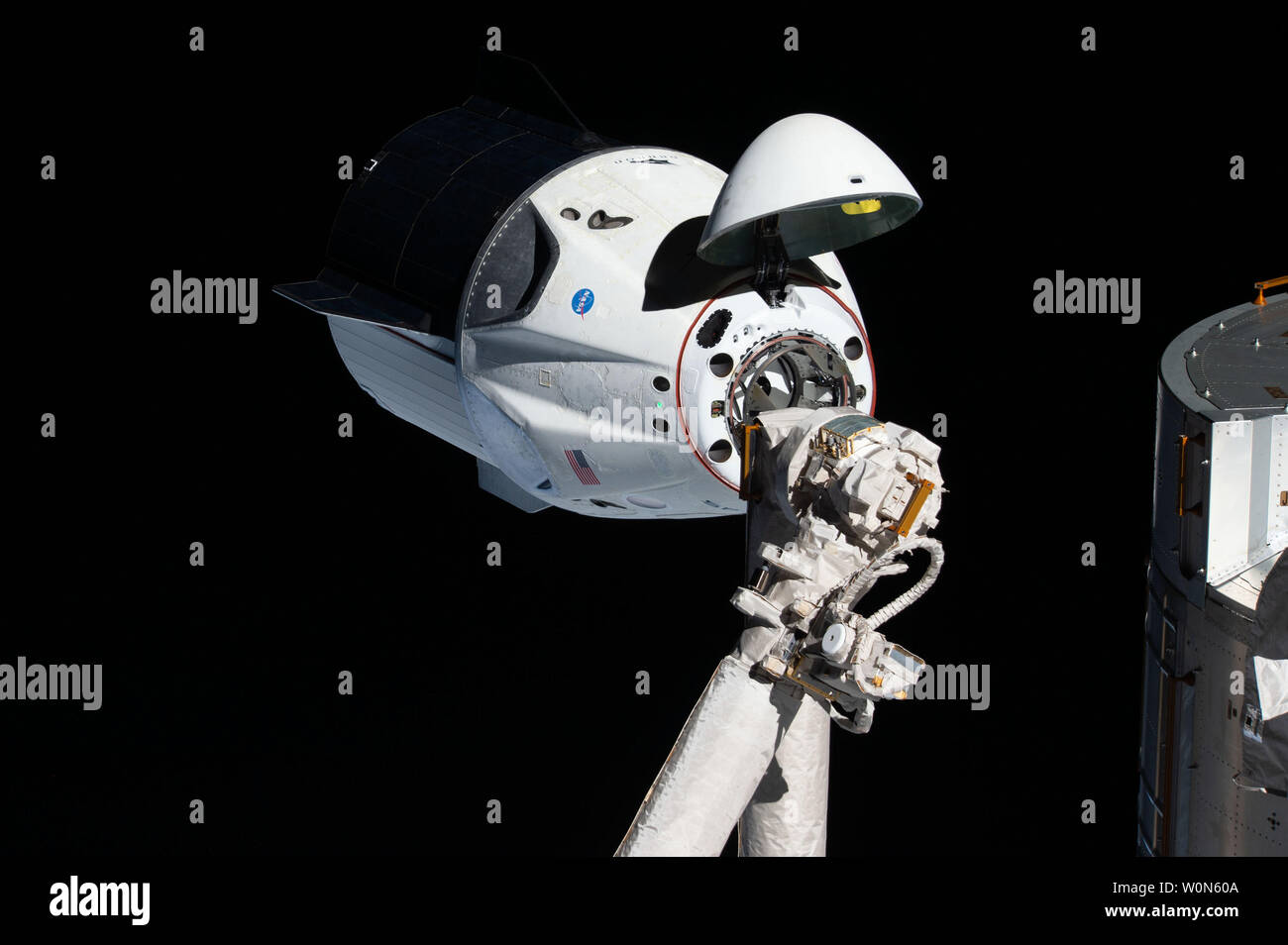 The uncrewed SpaceX Crew Dragon spacecraft is the first Commercial Crew ...